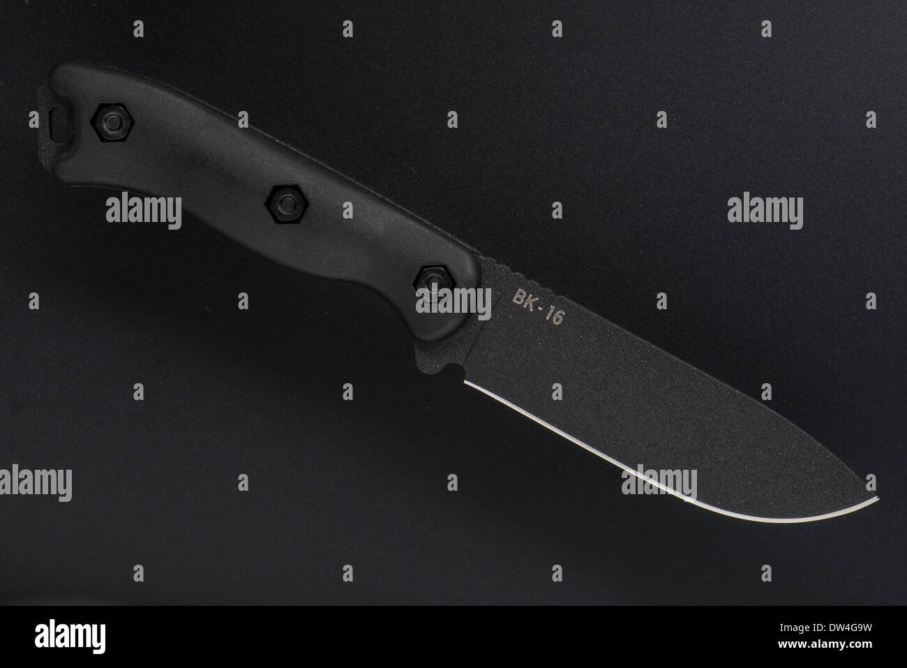 A Ka-Bar Becker BK-16 knife on a black background Stock Photo - Alamy