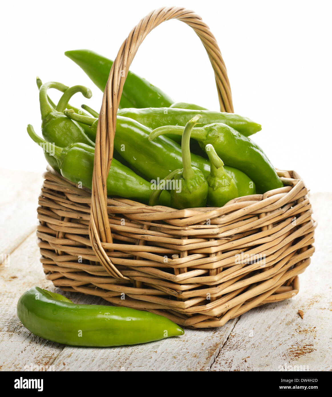 Fresh Green Peppers In A Basket Stock Photo - Alamy