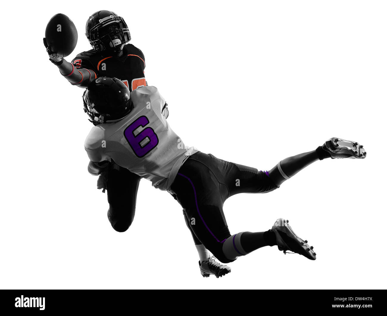 two american football players tackle in silhouette shadow on white ...