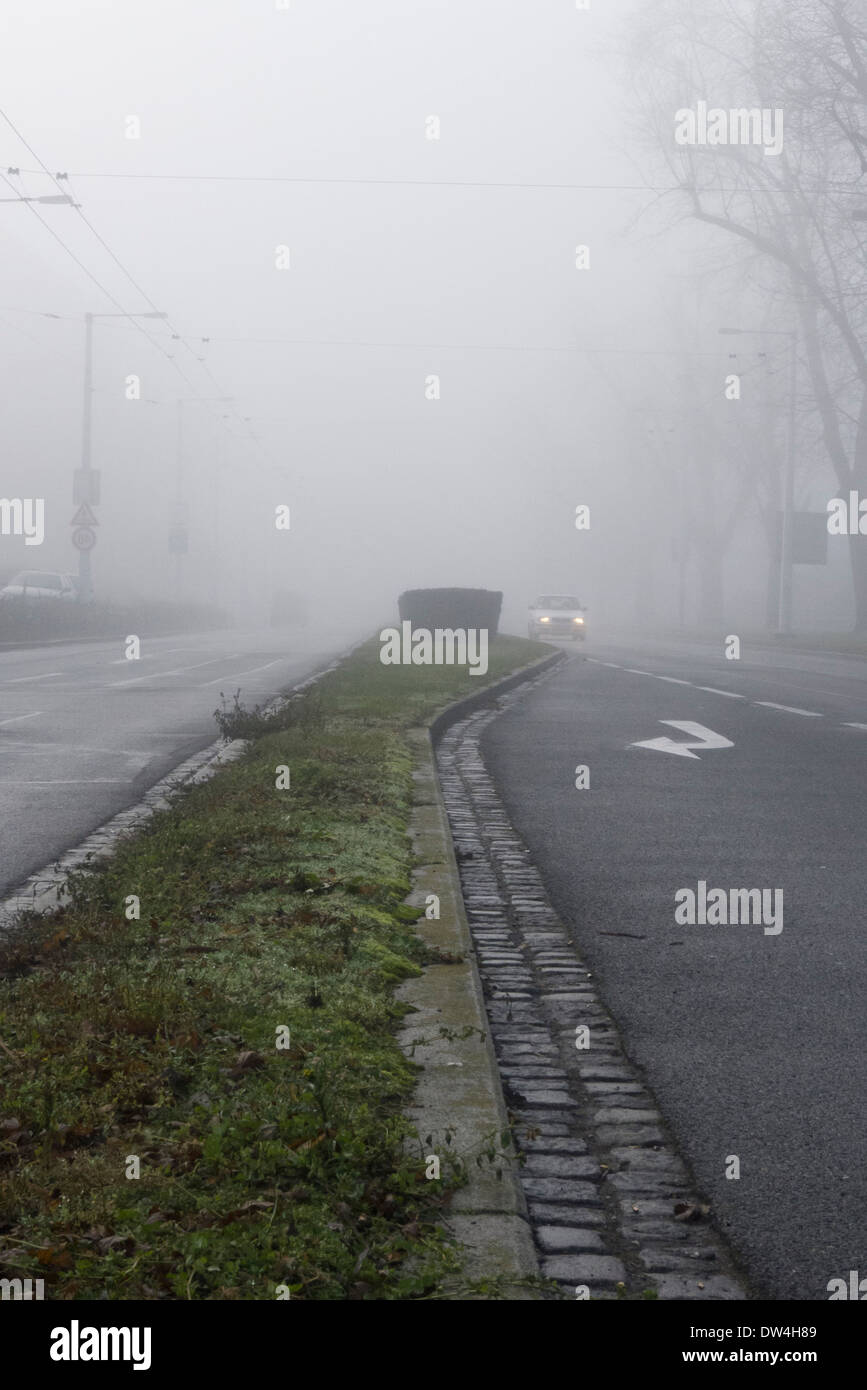 morning city street with fog Stock Photo - Alamy
