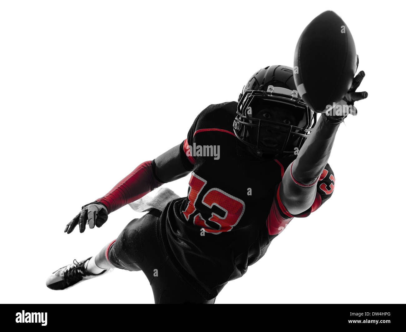 American football player catching ball hi-res stock photography and ...