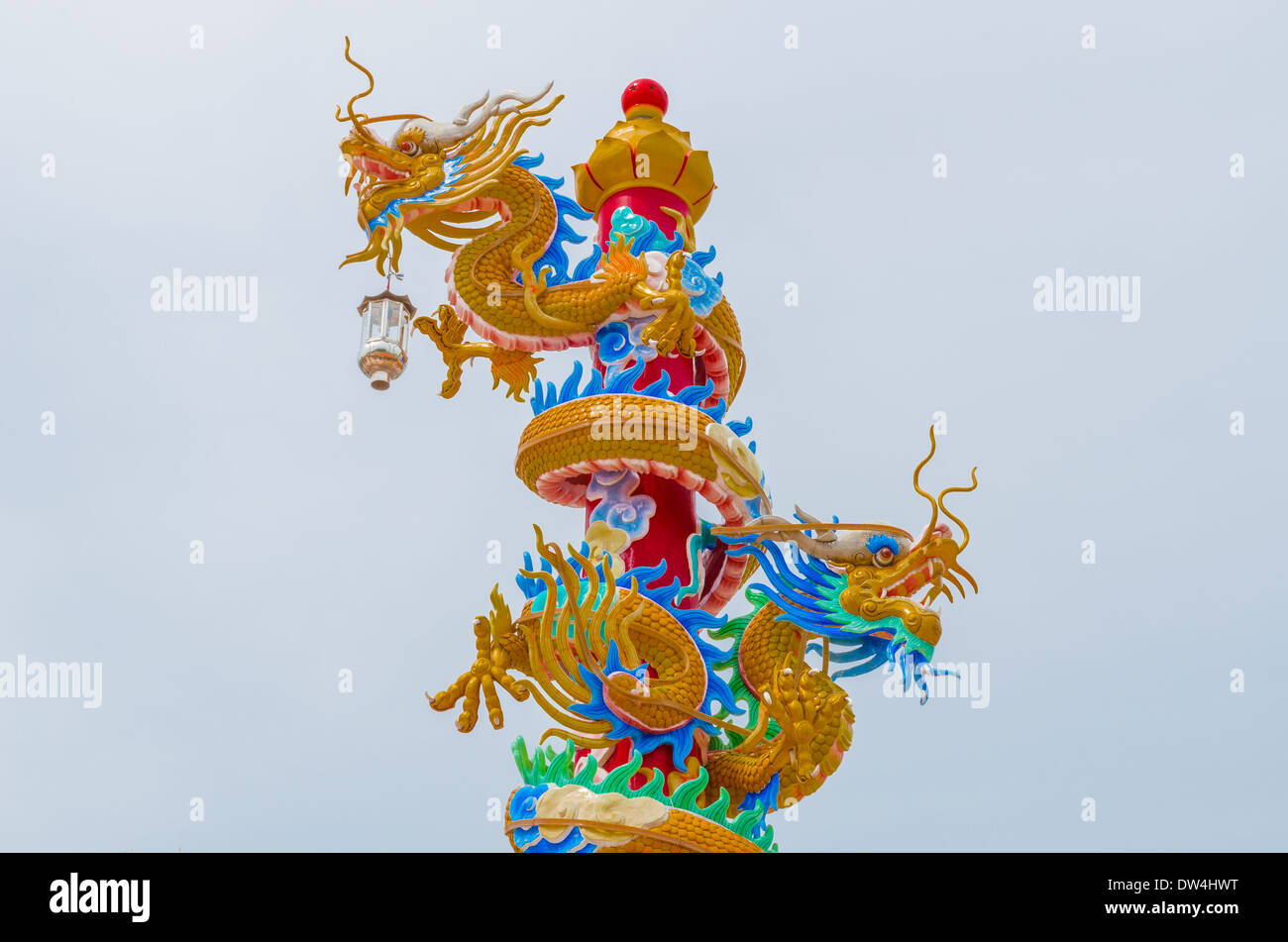 Native ancient Chinese dragon on the red pole Stock Photo - Alamy