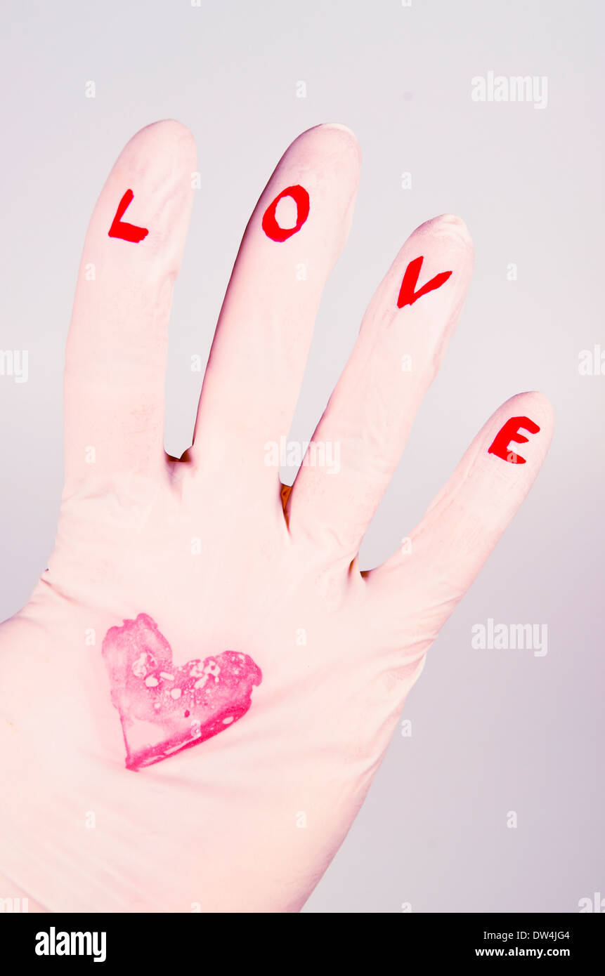 Red heart on a hand Stock Photo - Alamy