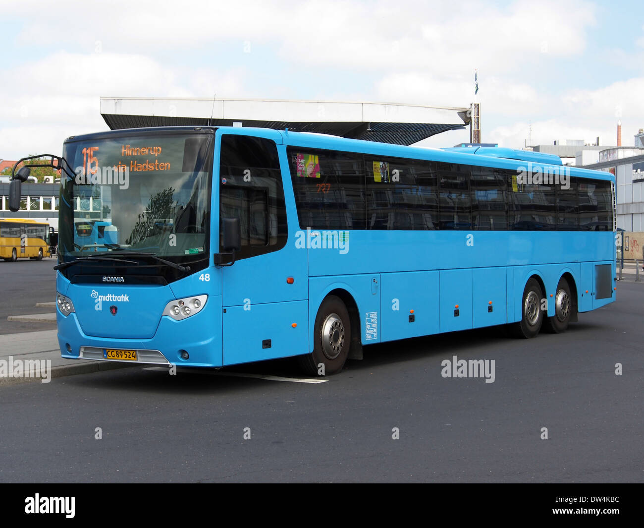 A blue Scania Midttrafik bus is captured in Randers, Denmark. The bus ...