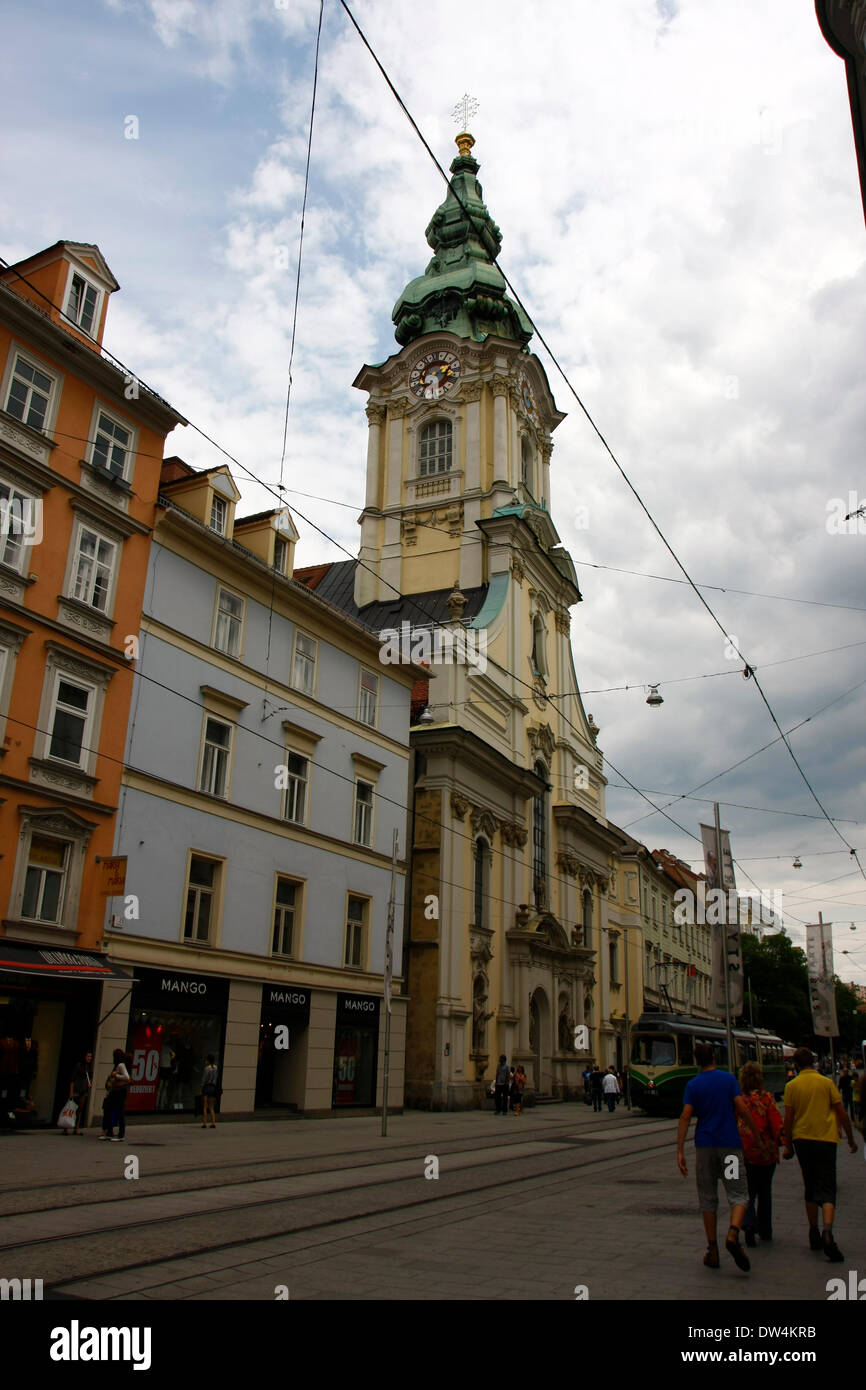 The facade of the parish church in the street Herrengasse. The Graz ...