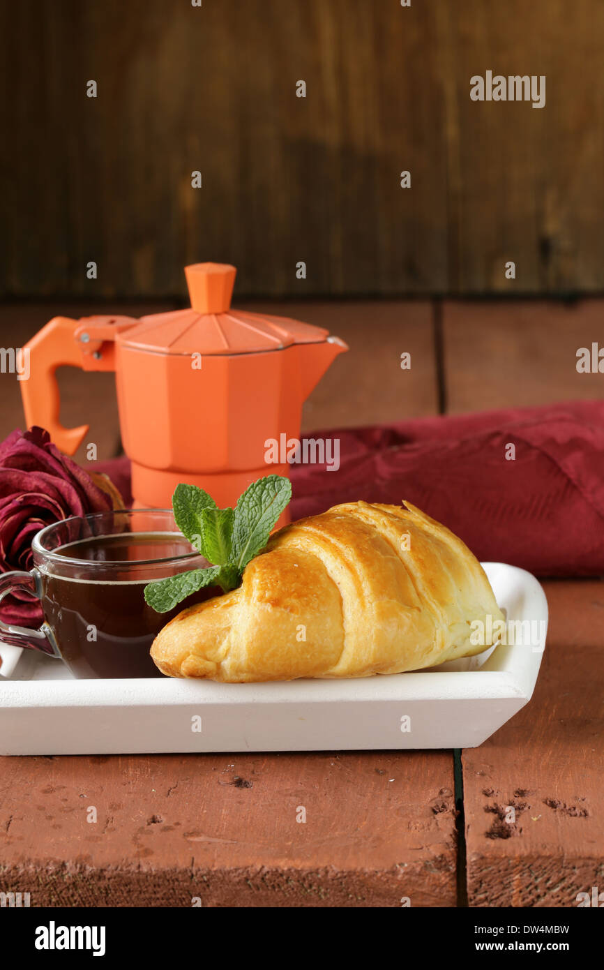 elegant coffee break or breakfast cup of coffee and croissant Stock ...