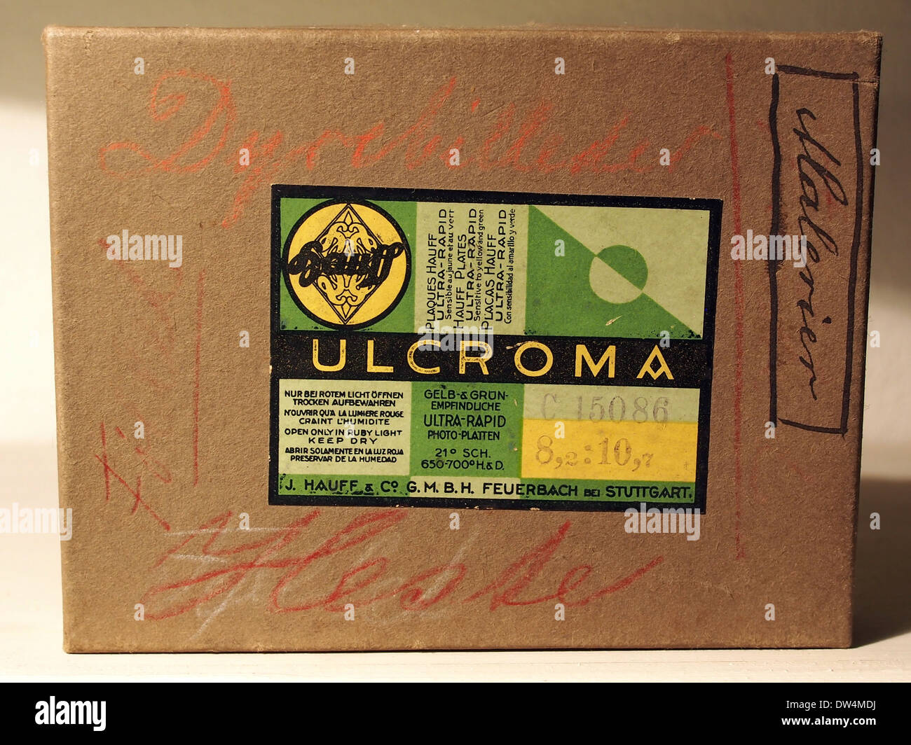 This collection of old photographic equipment includes cameras, lenses ...