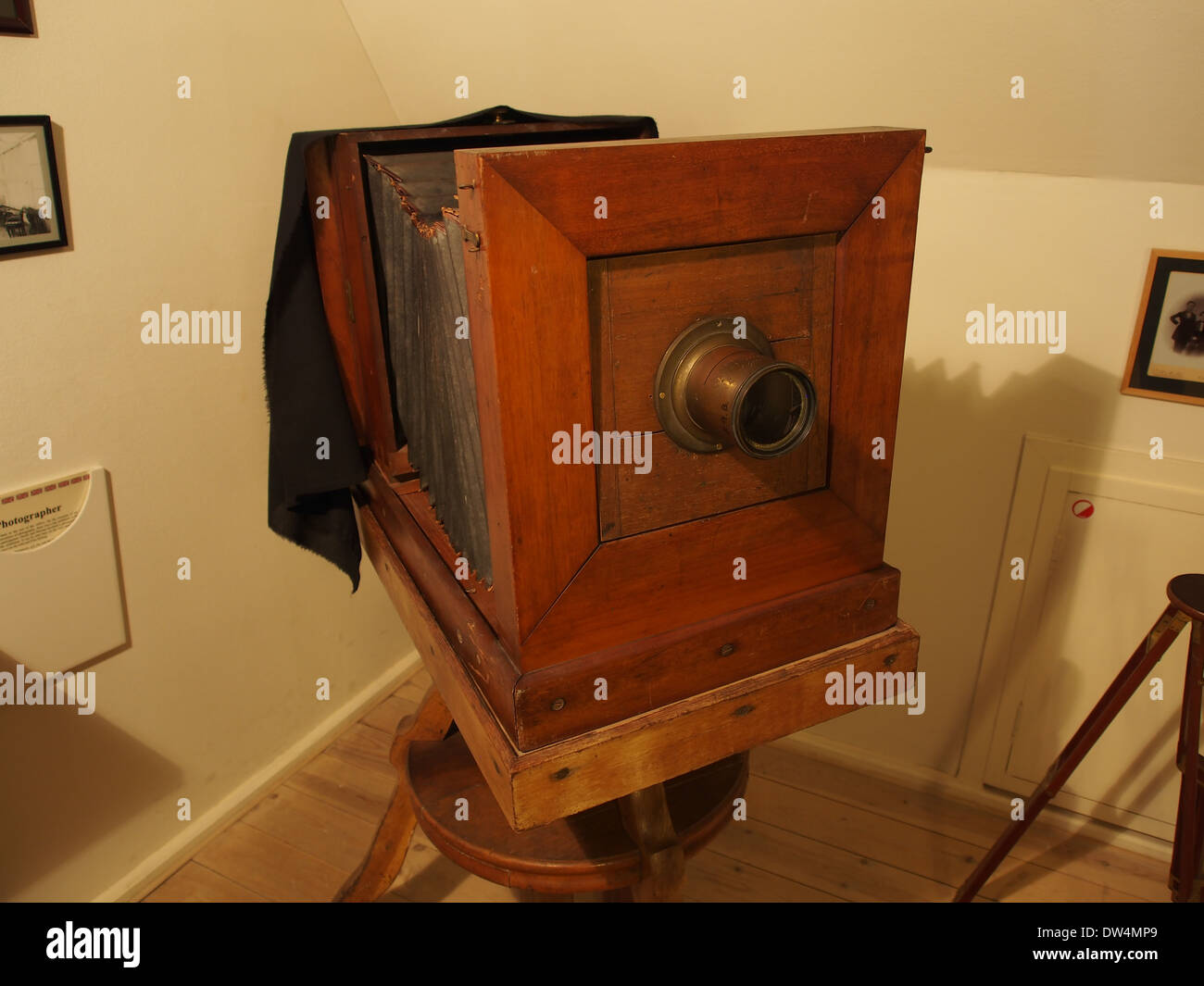 A collection of old photographic equipment, including cameras and ...