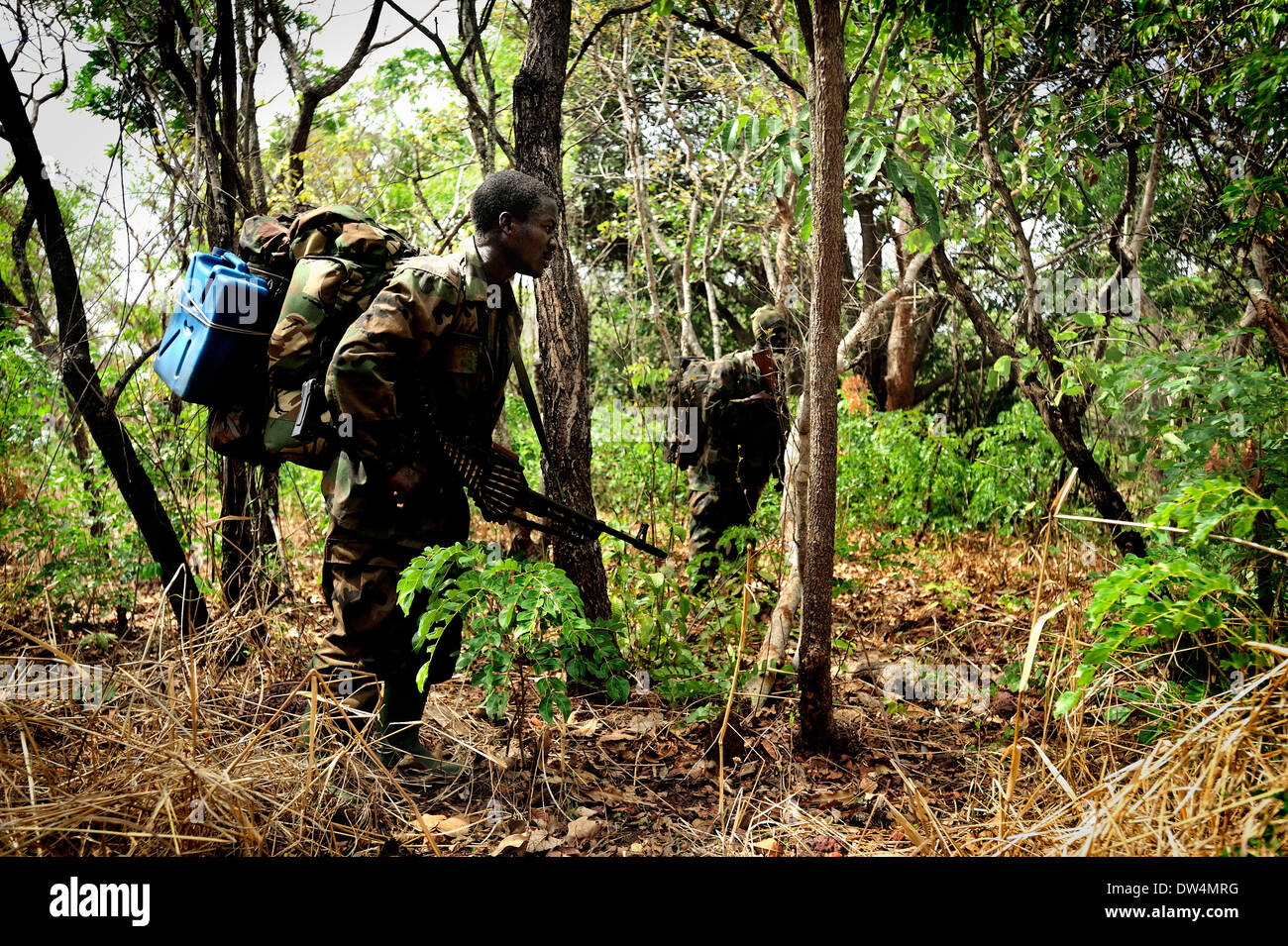 Ugandan soldiers of the Uganda People's Defence Force (UPDF) patrol ...