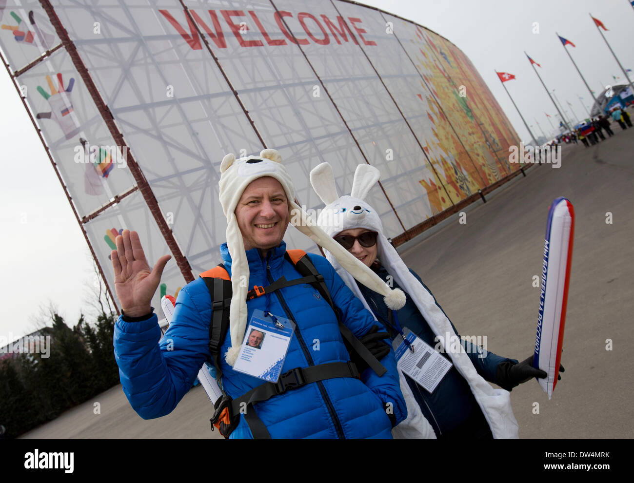 Sochi, Russia. 22nd Feb, 2014. Spectator wear the Hare mascot hat and ...