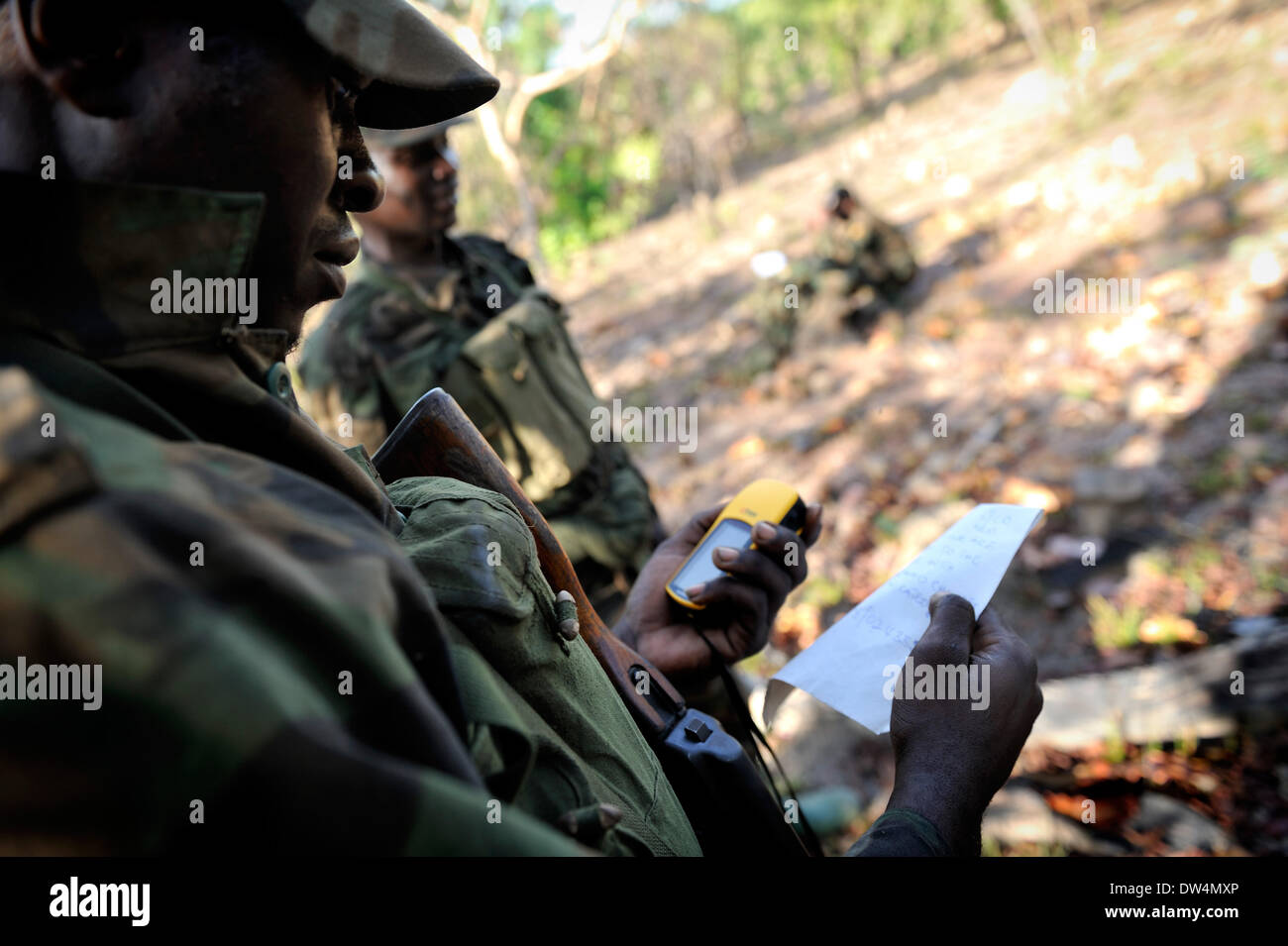 Ugandan soldiers of the Uganda People's Defence Force (UPDF) patrol ...