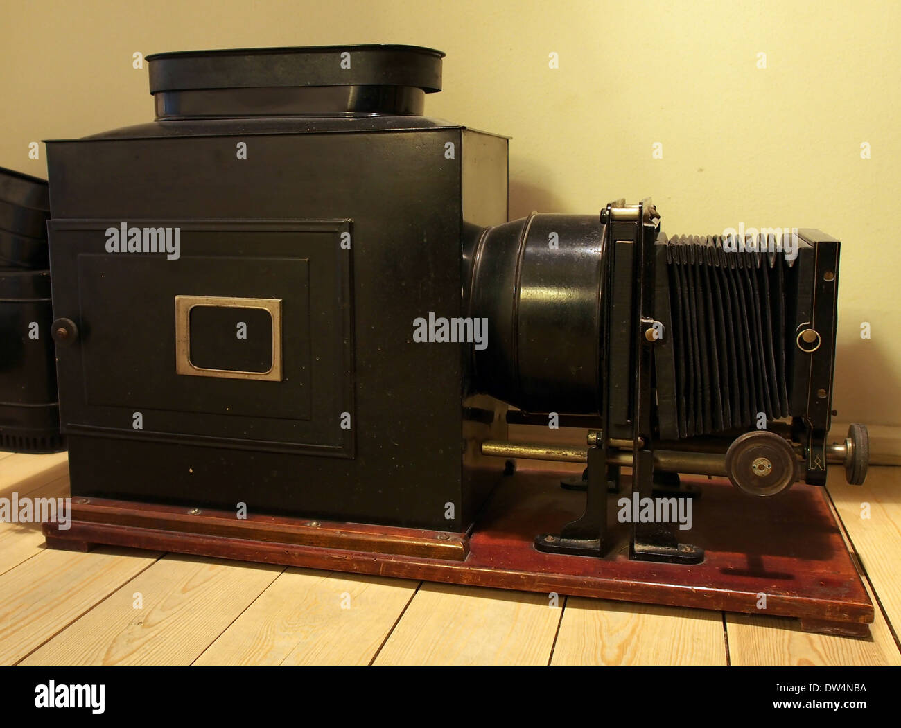 This image features old photographic equipment, including cameras and ...