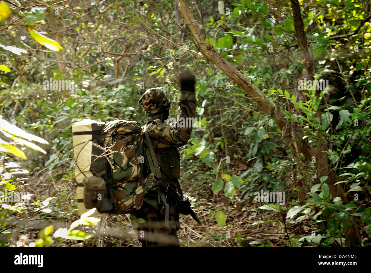 Ugandan soldiers of the Uganda People's Defence Force (UPDF) patrol ...