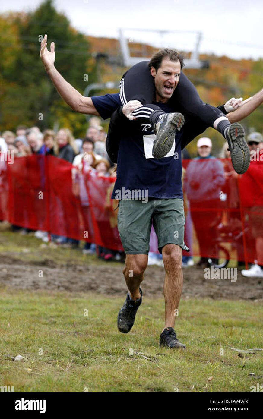 WIFE CARRYING COMPETITION These men really know how to sweep a girl off ...