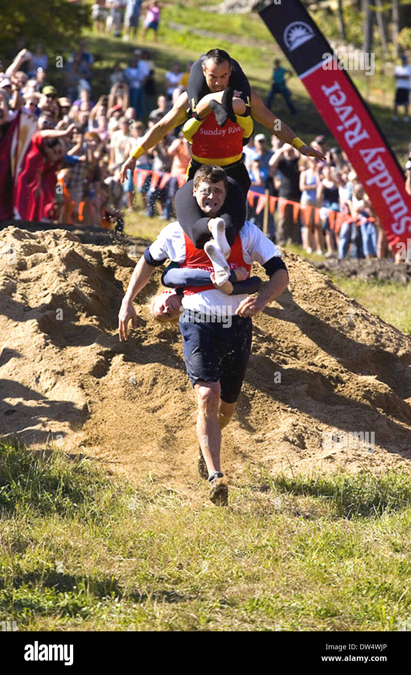 WIFE CARRYING COMPETITION These men really know how to sweep a girl off ...
