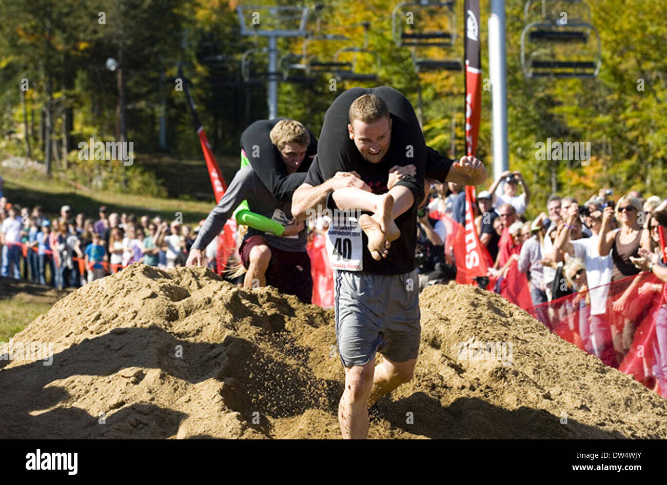 WIFE CARRYING COMPETITION These men really know how to sweep a girl off ...