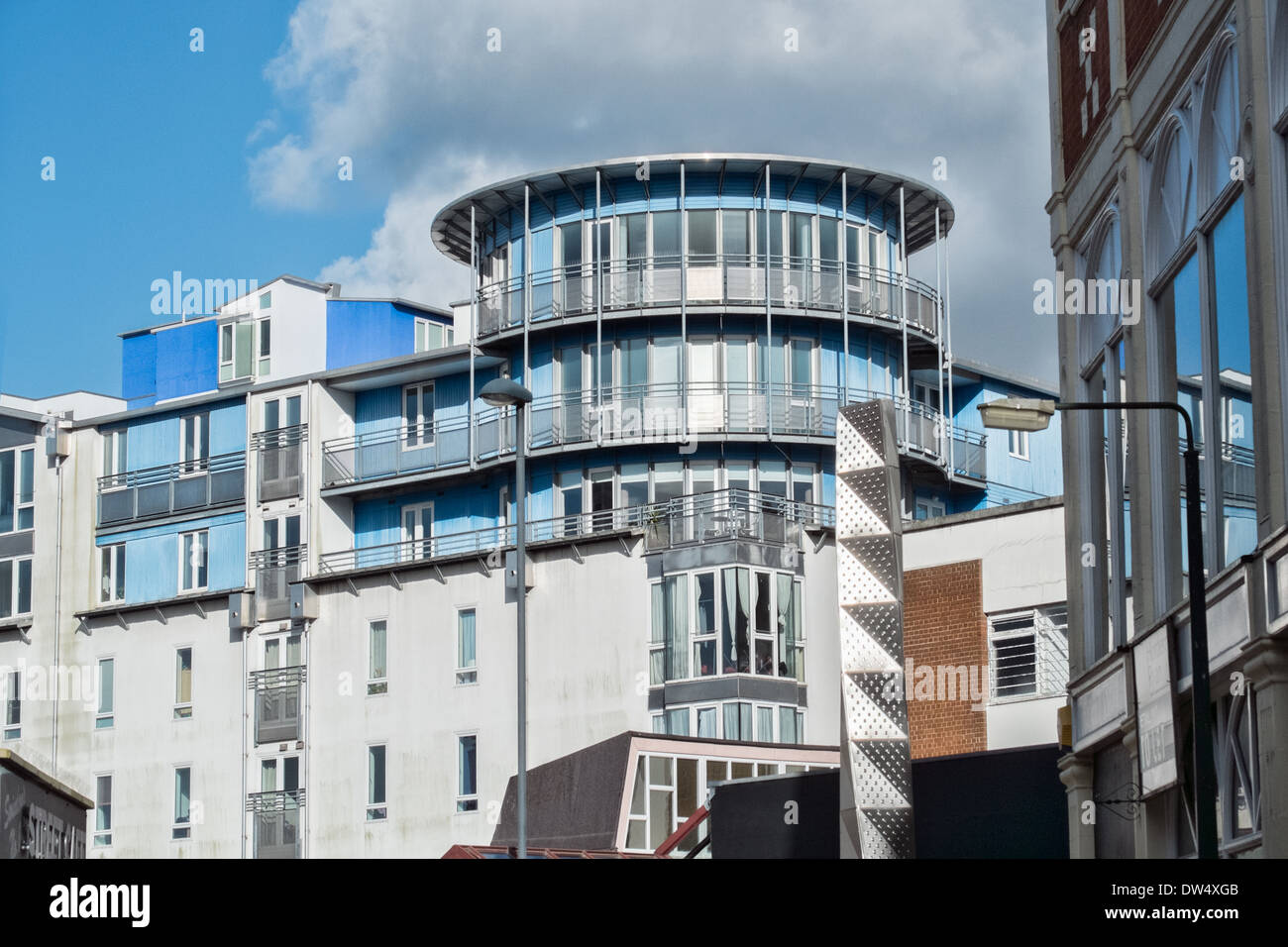 A view of a modern apartment building in the town center of Swindon ...