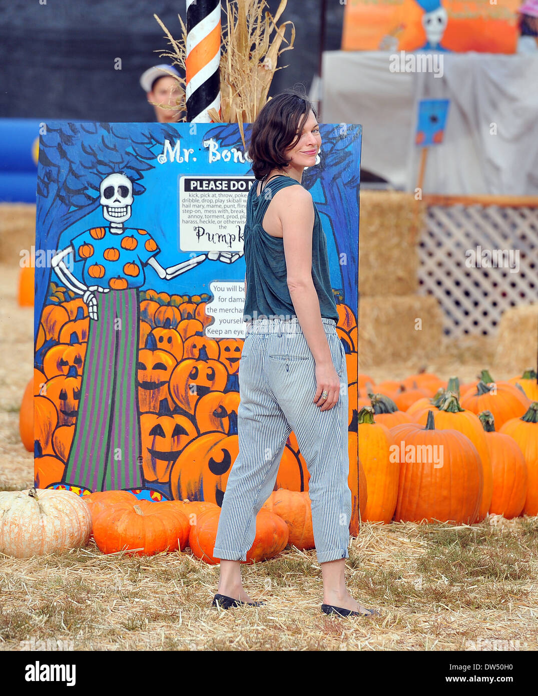Milla Jovovich at Mr. Bones Pumpkin Patch. Los Angeles, California - 09.10.12 Featuring: Milla ...