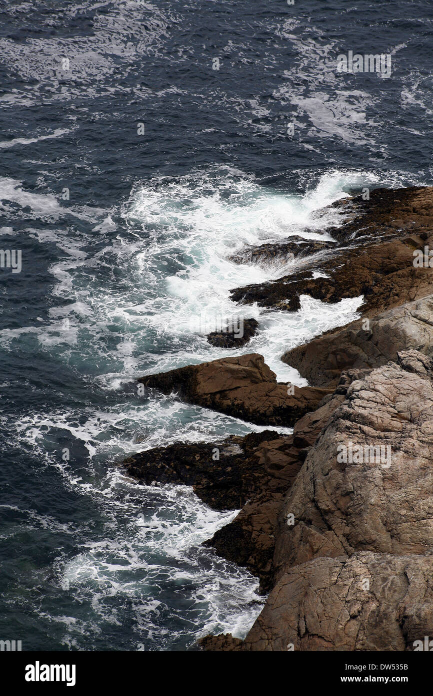 Cliff in the ocean Stock Photo - Alamy