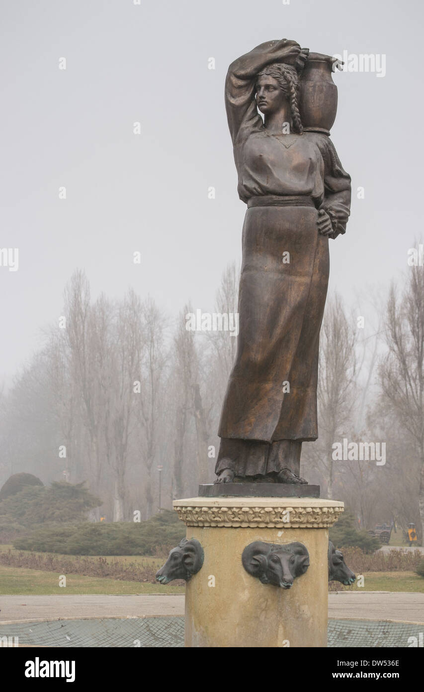 Statue if a woman carrying water, Herastrau Park, Bucharest, Romania ...