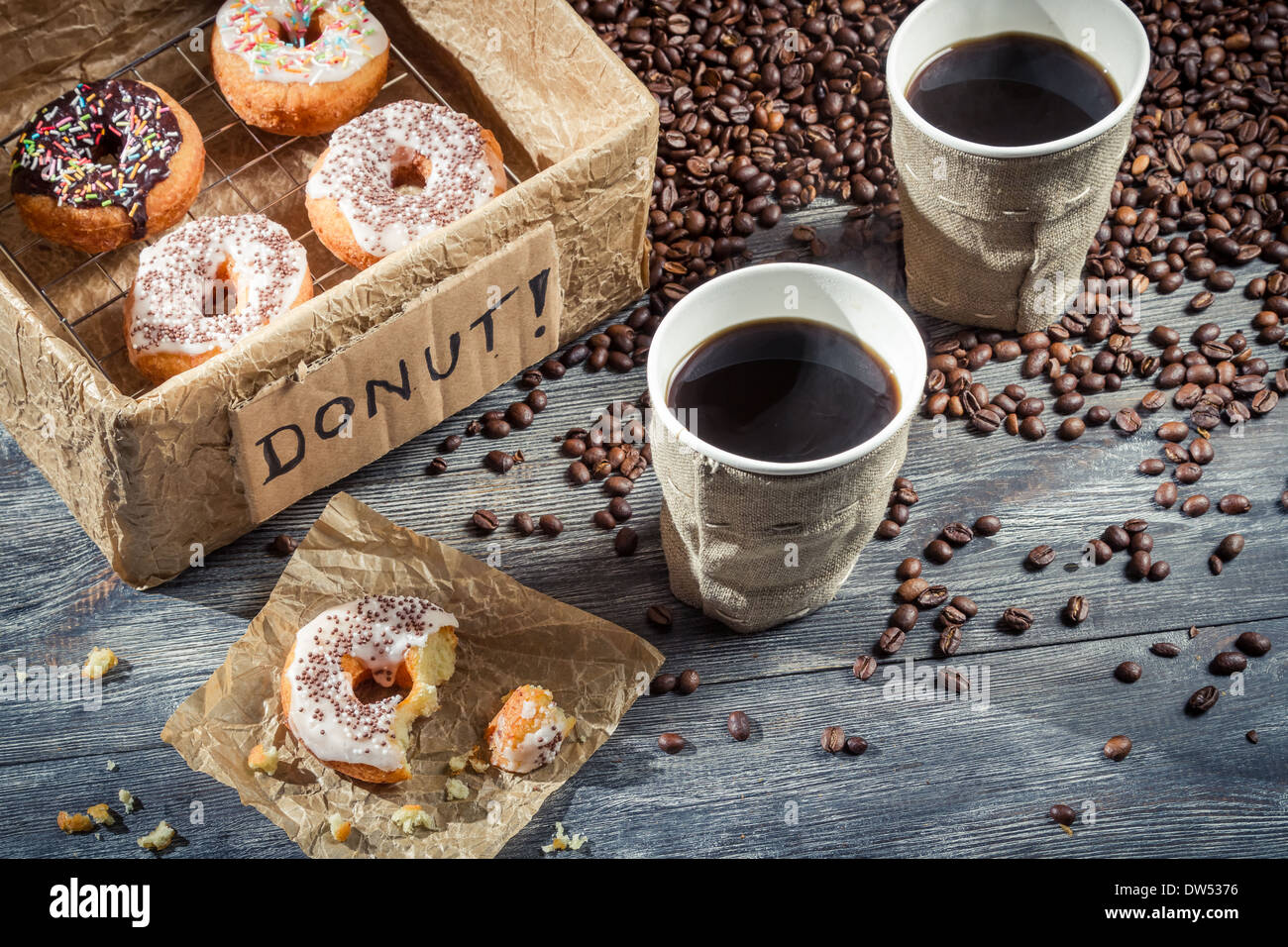 Fresh donuts to take away Stock Photo - Alamy