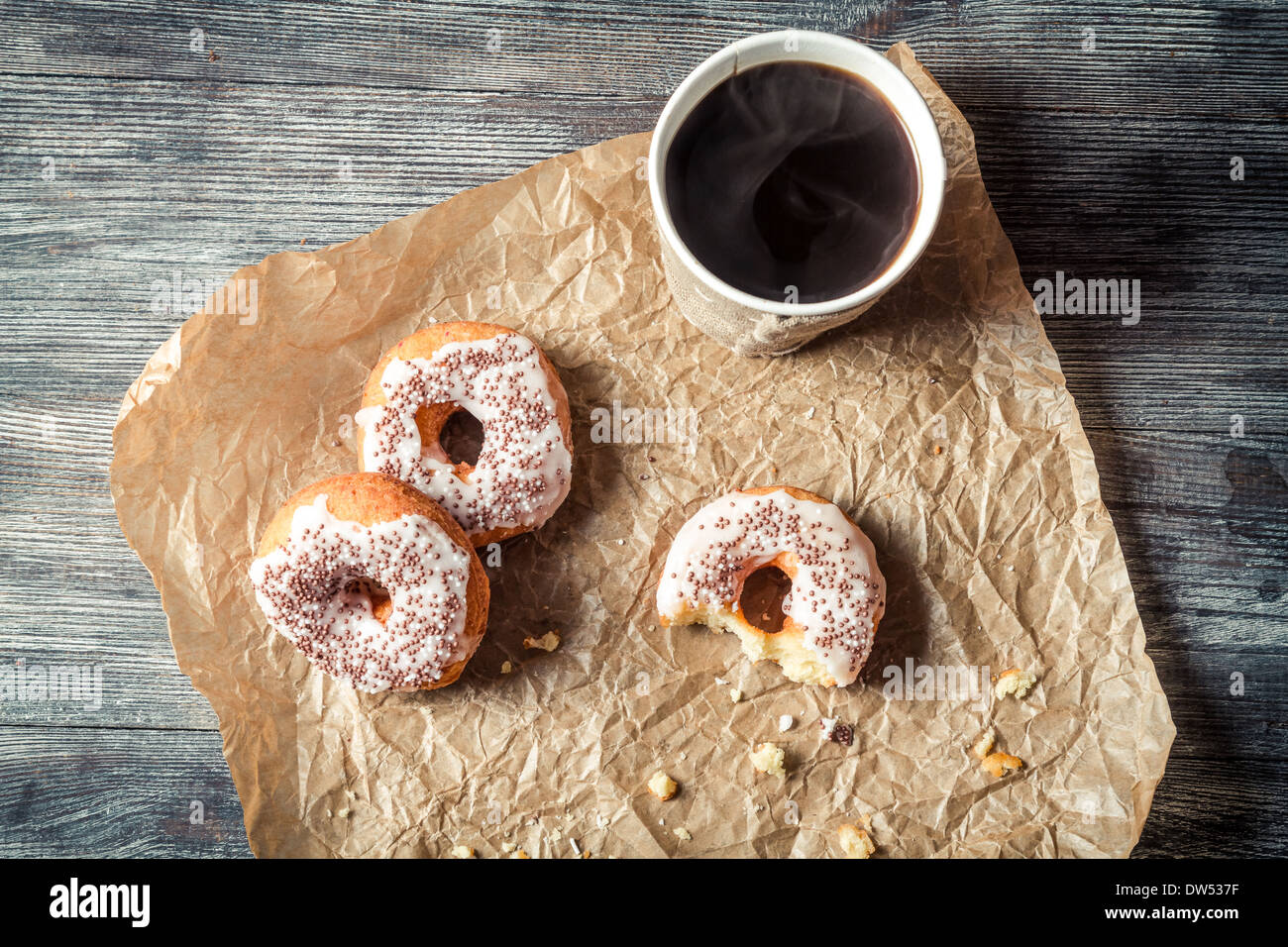 Donuts and coffee background Stock Photo - Alamy