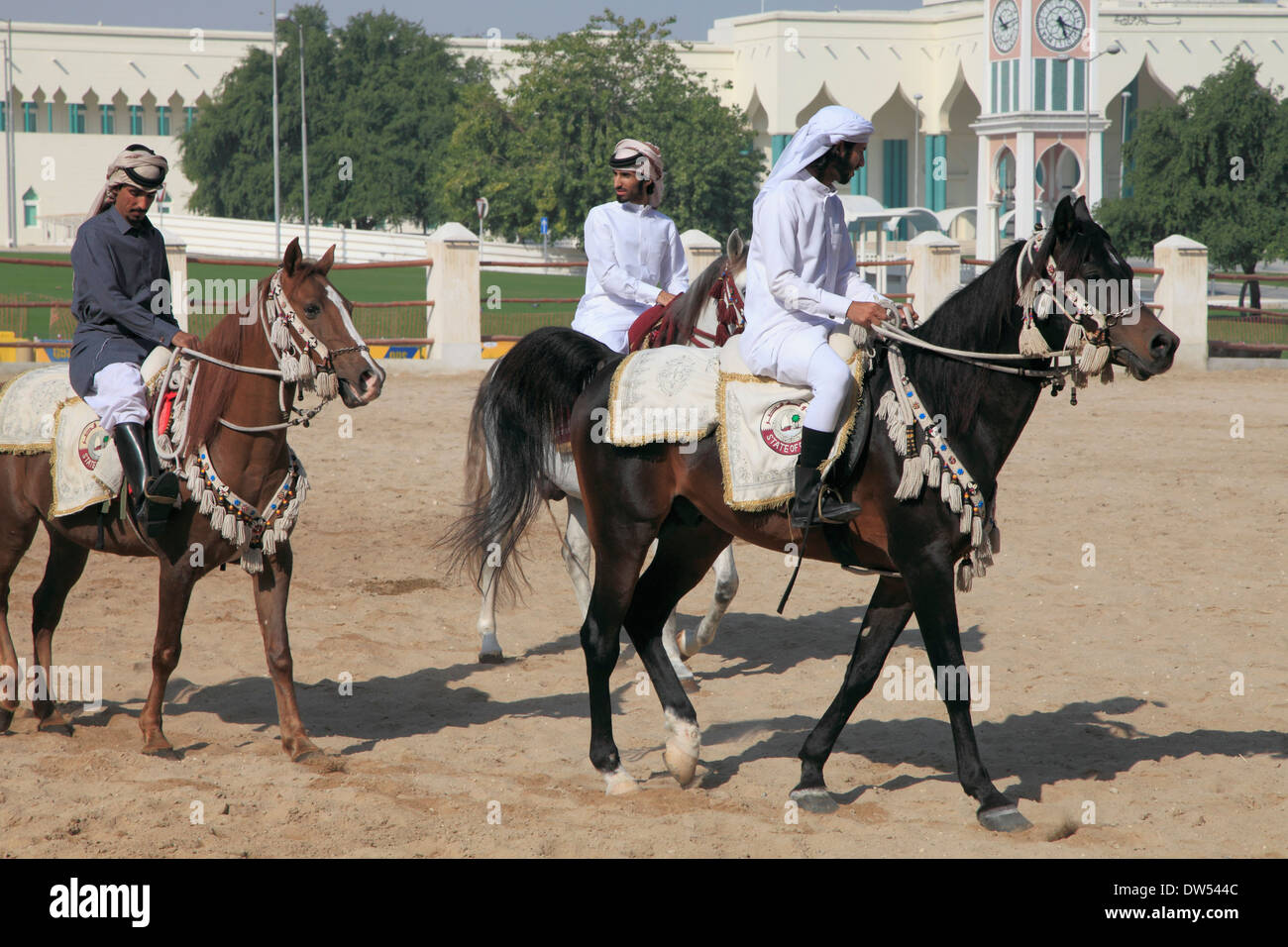 Qatar, Doha, Souq Waqif, horseback riders Stock Photo - Alamy