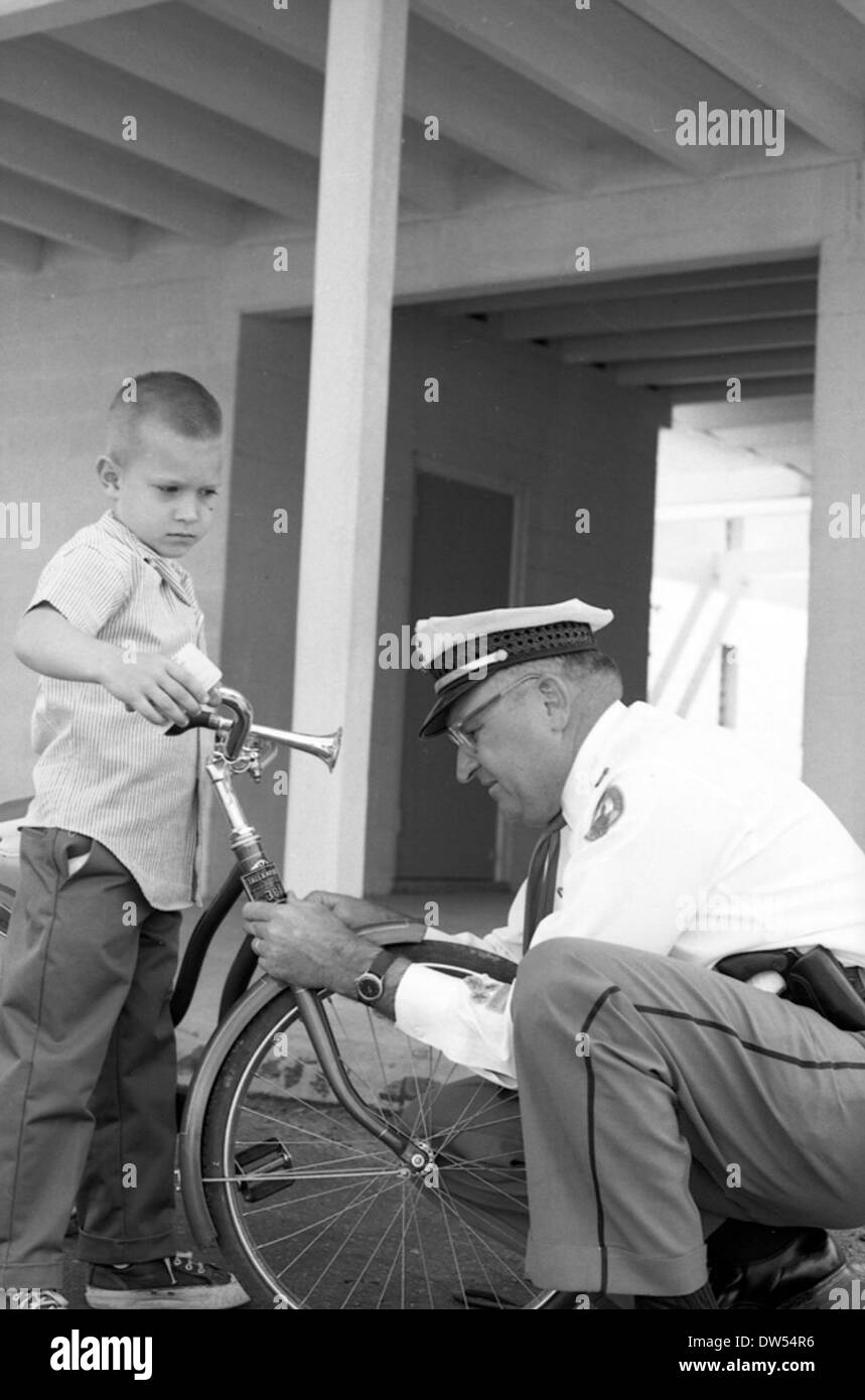 Sergeant Sid Keller of the Tallahassee Police Department inspects a ...