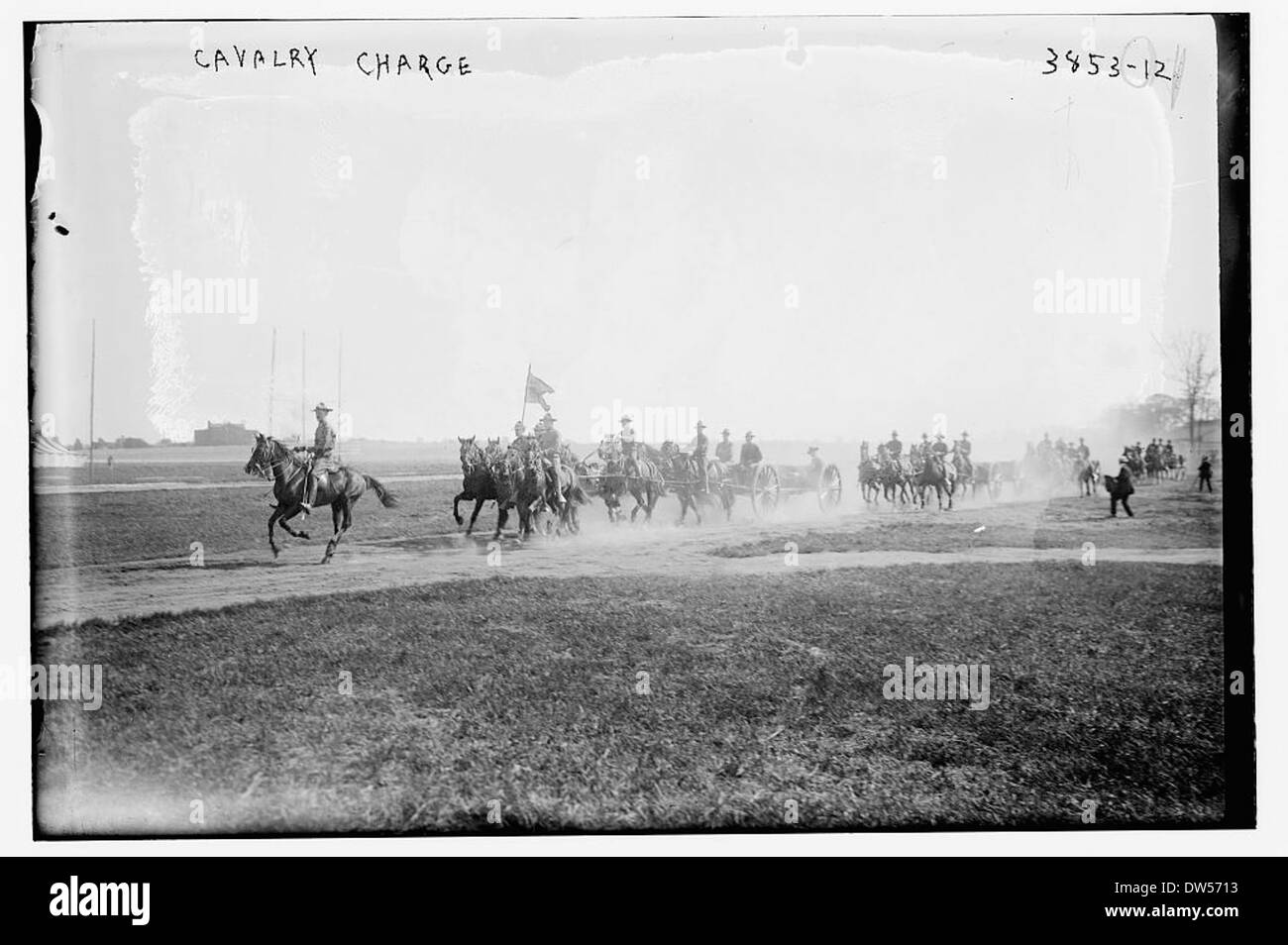 This vintage photograph captures a cavalry charge, illustrating a ...