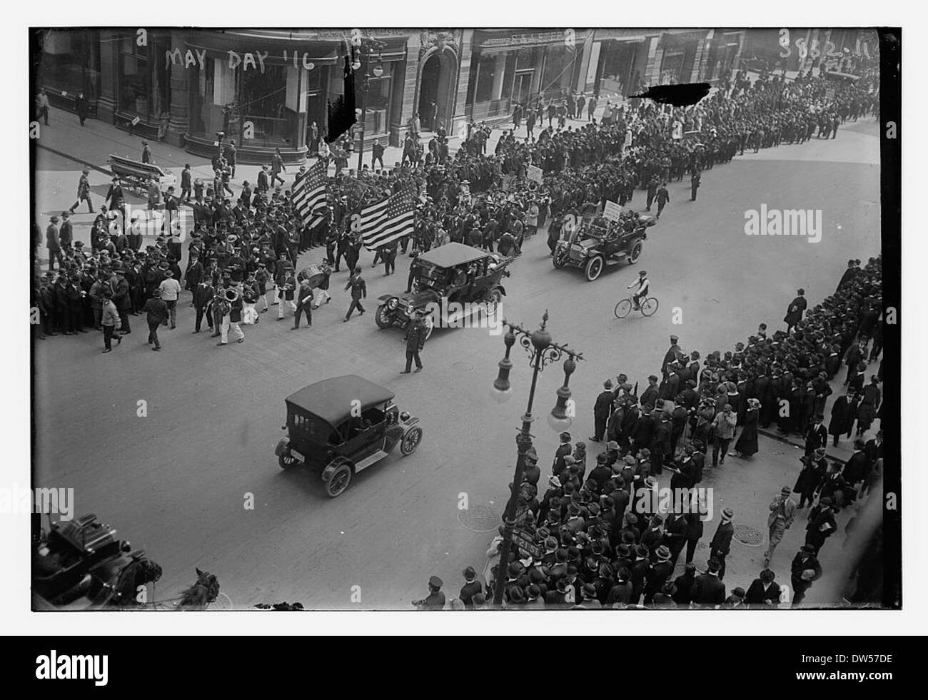 This vintage photograph from 1916, titled 'May Day,' captures a moment ...