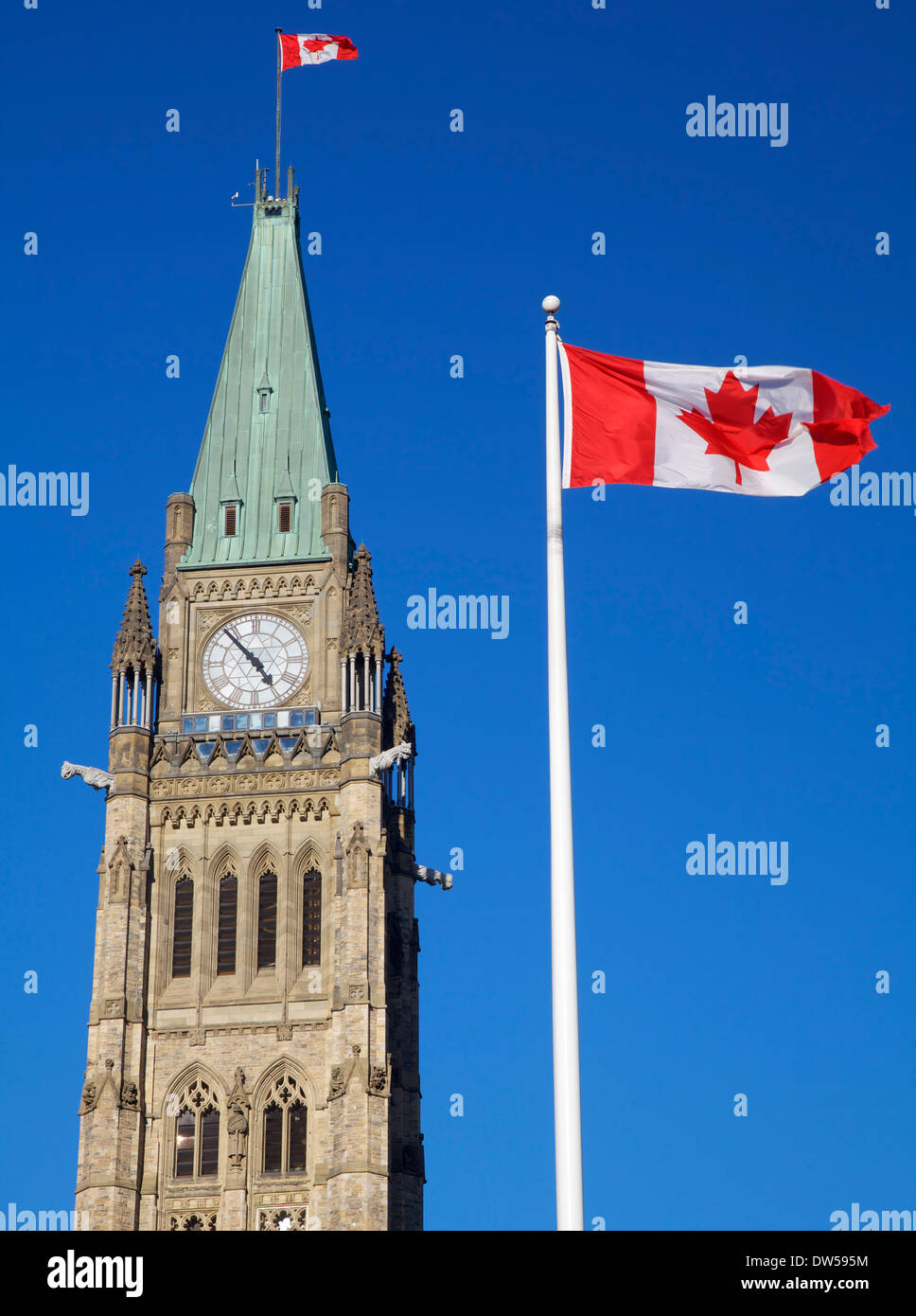 Parliament of Canada, Peace Tower and Canadian flag Stock Photo - Alamy