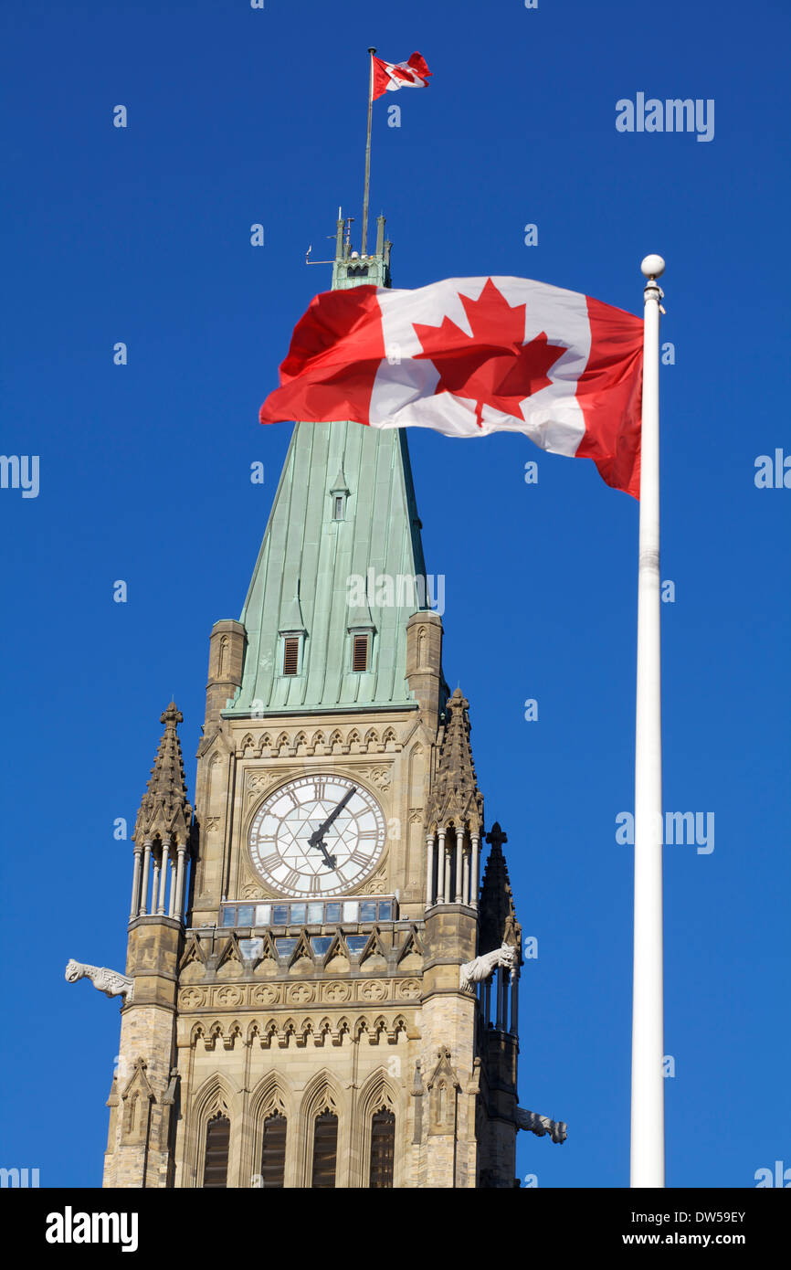Parliament of Canada, Peace Tower and Canadian flag Stock Photo - Alamy