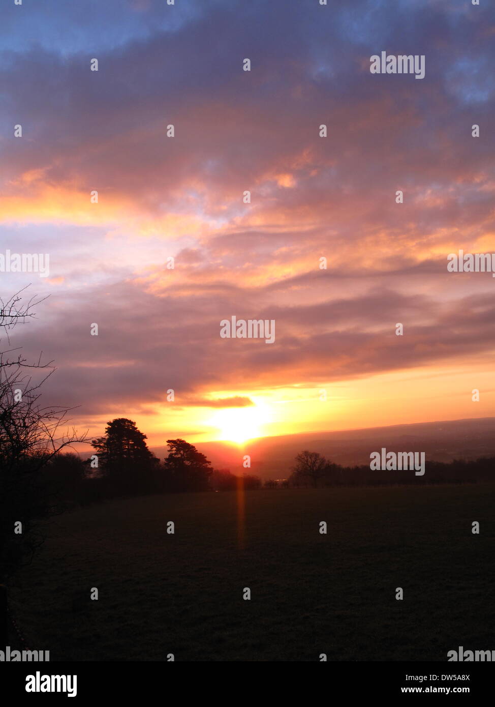 Lennoxtown, UK. 28th Feb, 2014. Cold clear day sunrise over Glasgow and ...