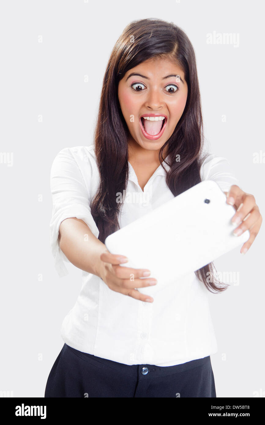indian Business Woman Watching phone Stock Photo - Alamy