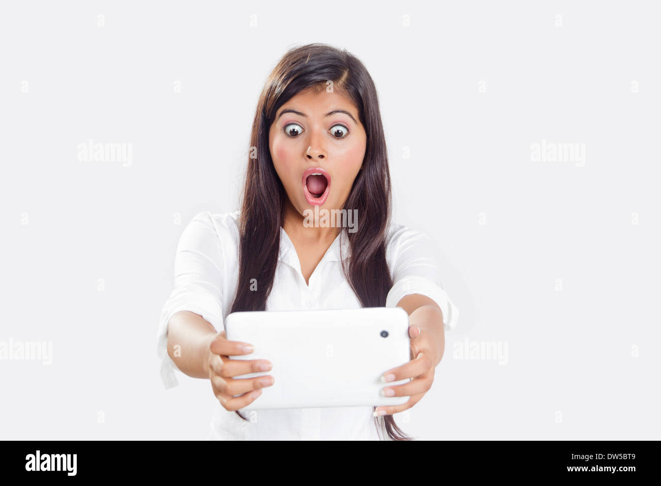 Indian business woman watching phone hi-res stock photography and ...