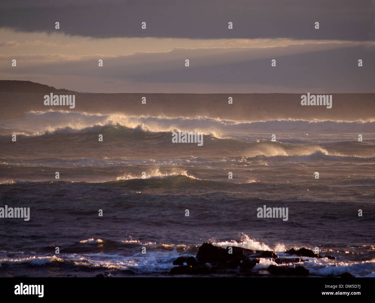 Waves from the Atlantic roll into the island of Lanzarote Stock Photo ...