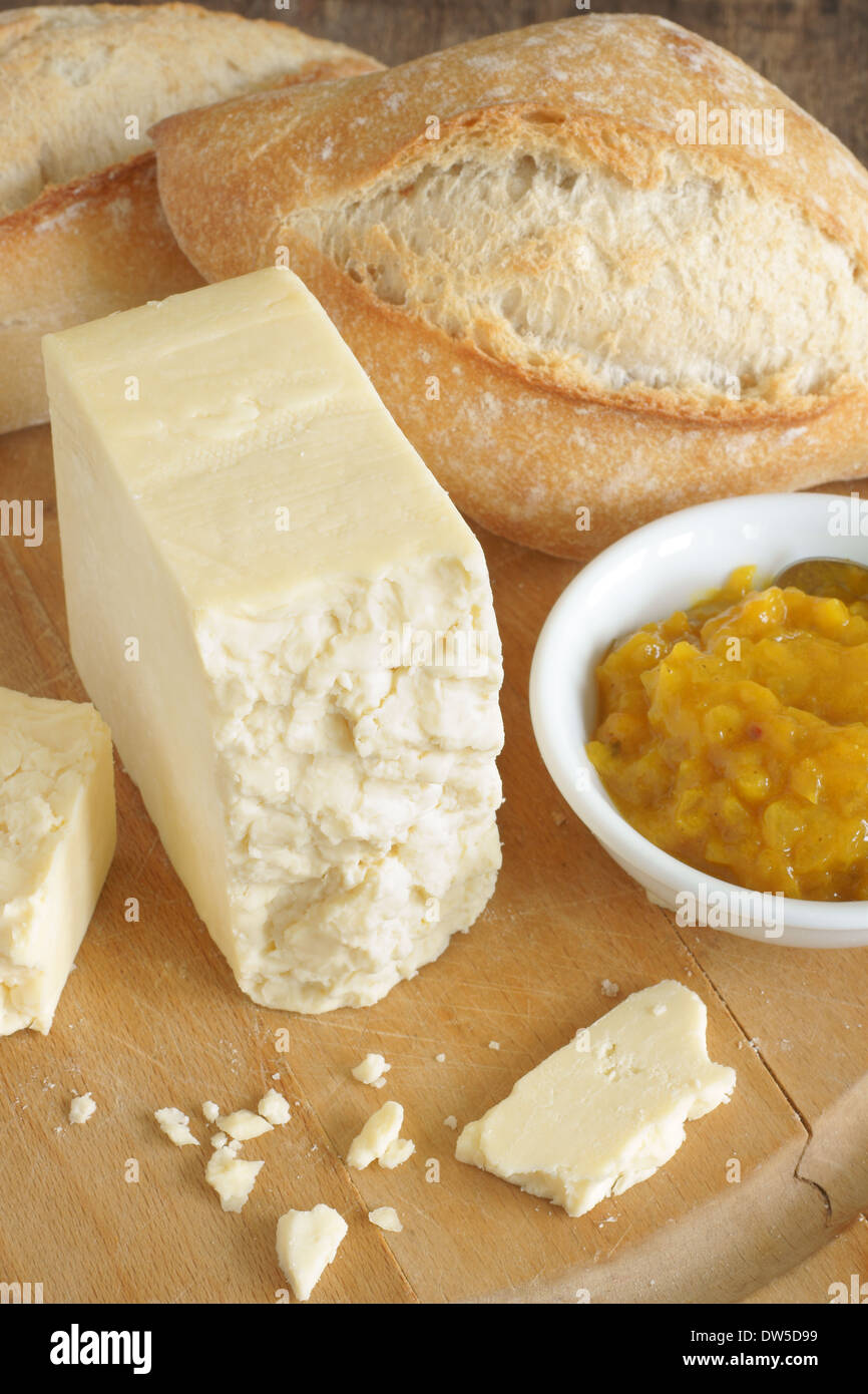 Cheshire a traditional British cheese with bread and pickle Stock Photo ...