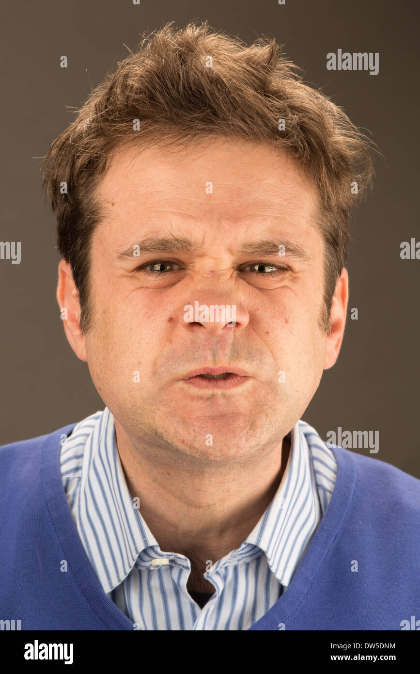 An aggressive looking man Stock Photo - Alamy