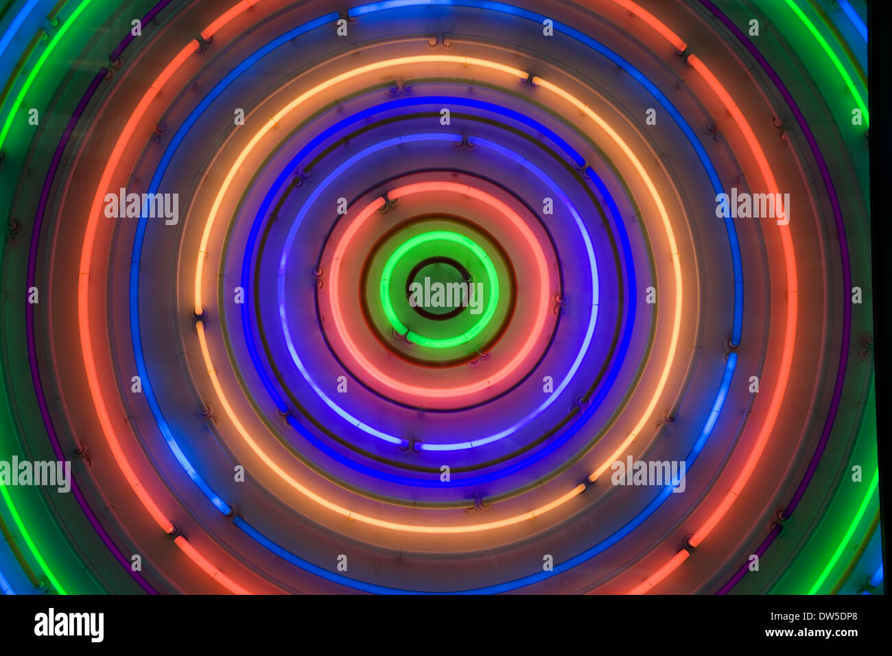 Multi colured neon light tubes in concentric circles Stock Photo - Alamy
