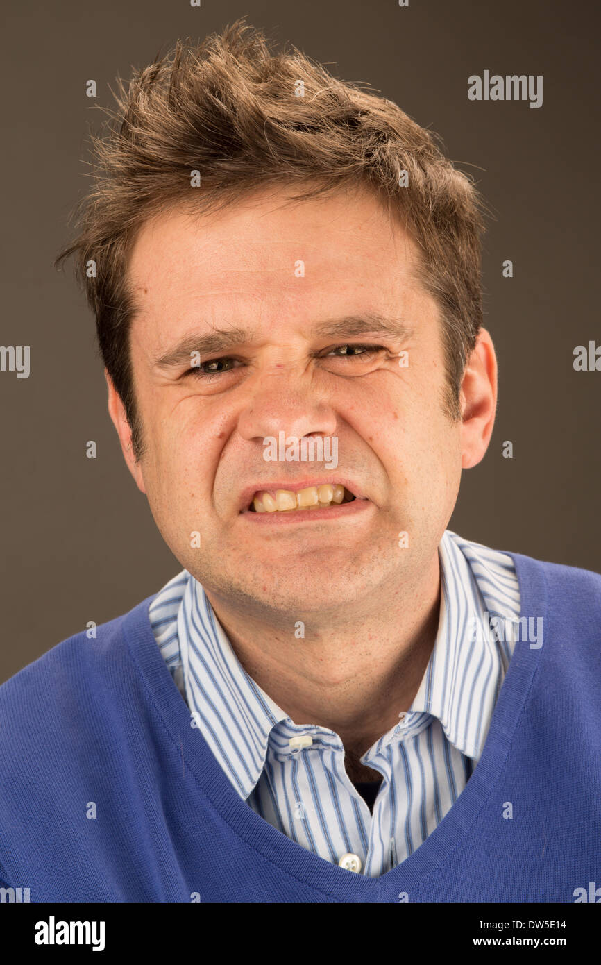 A man looking angry Stock Photo - Alamy