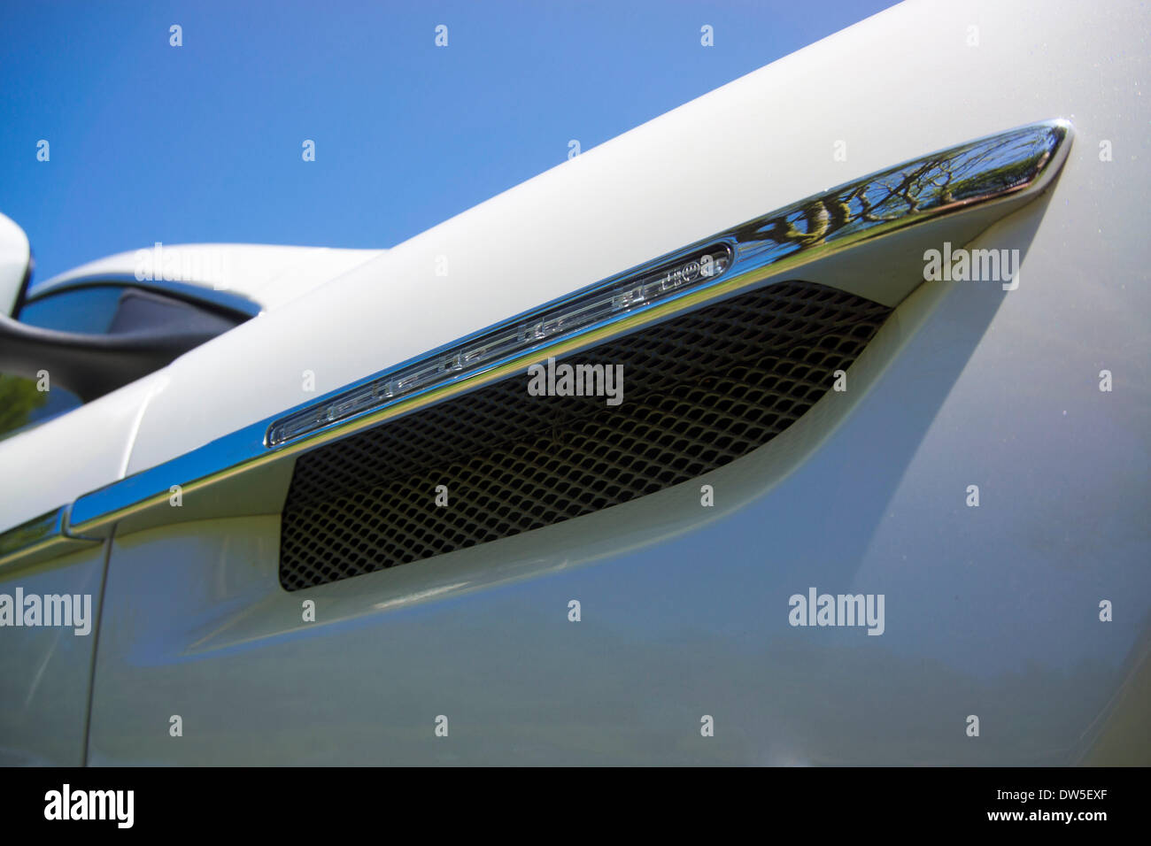 Detail of an Aston Martin DB9, ventilation inlet and direction ...