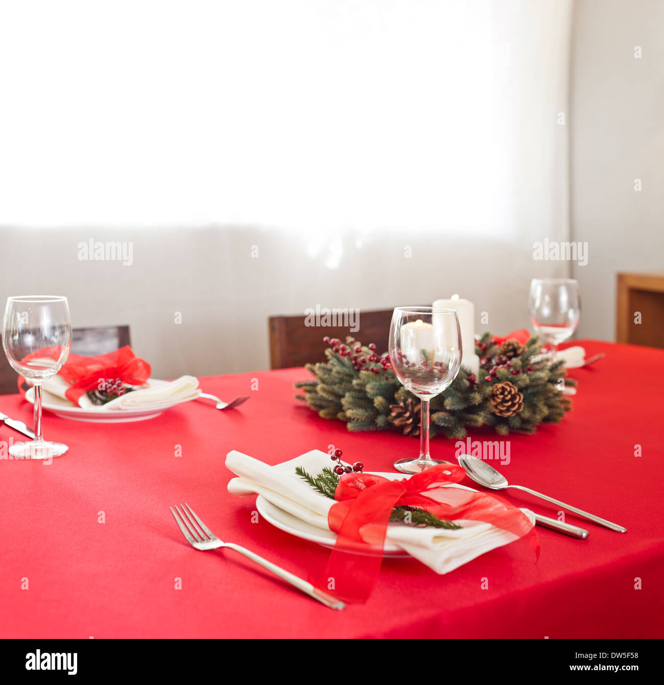 Christmas dinner table setup with advent decoration Stock Photo - Alamy