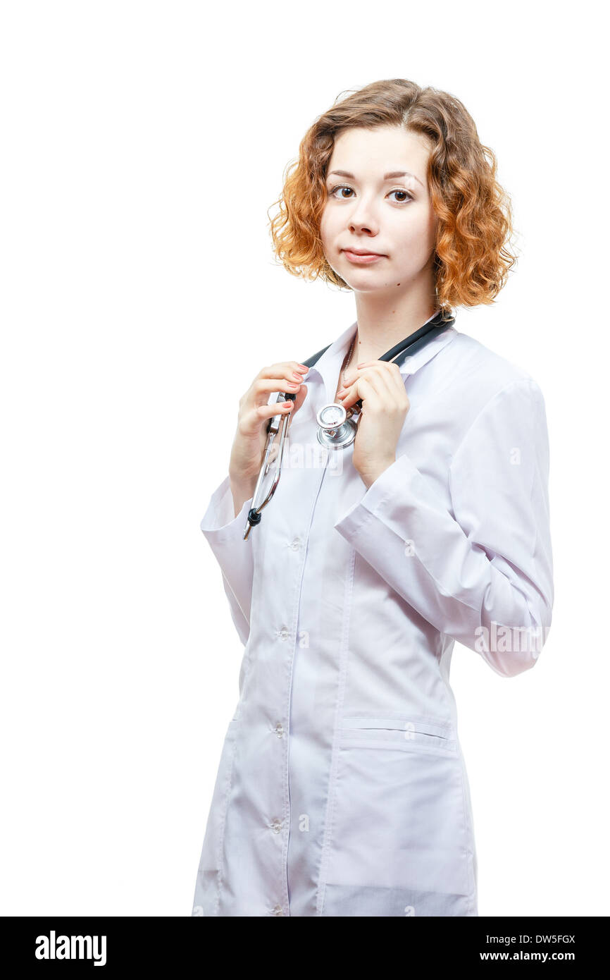 cute redhead doctor in lab coat with stethoscope isolated on white ...