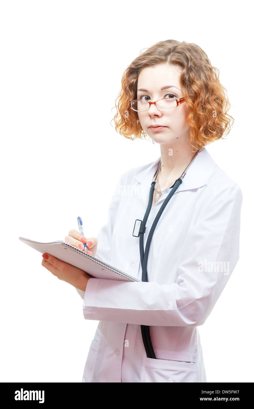 Cute Redhead Doctor In Lab Coat And Glasses With Nothebook Isolated On White Background Stock