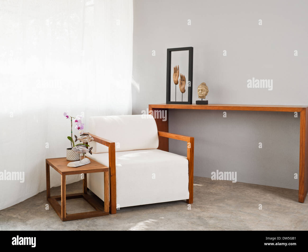 Bright white sofa seat in simple setting Stock Photo - Alamy