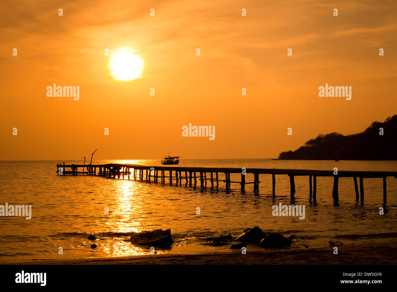 tropical beach at sunset Stock Photo - Alamy
