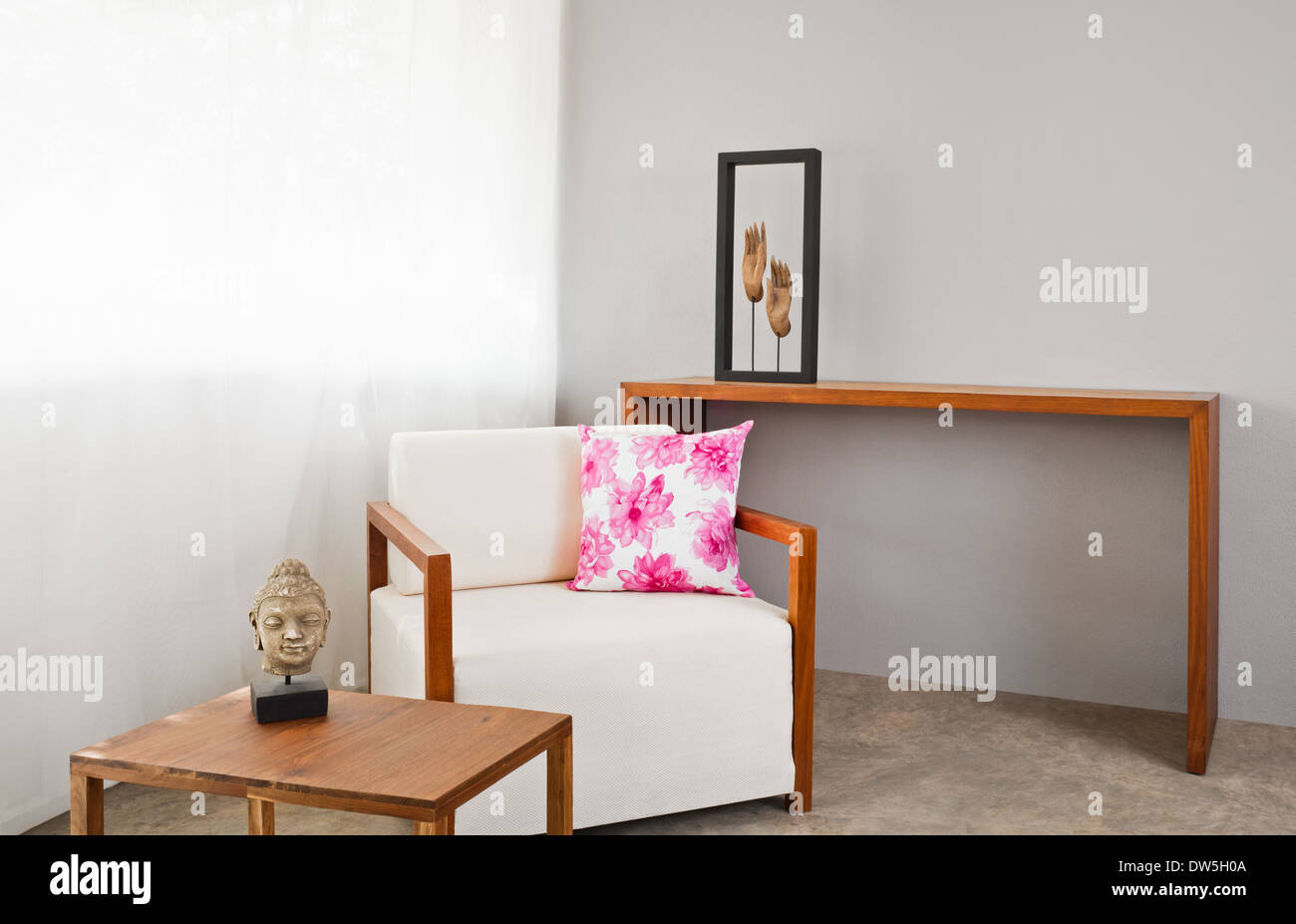 Bright white sofa seat in simple setting Stock Photo - Alamy