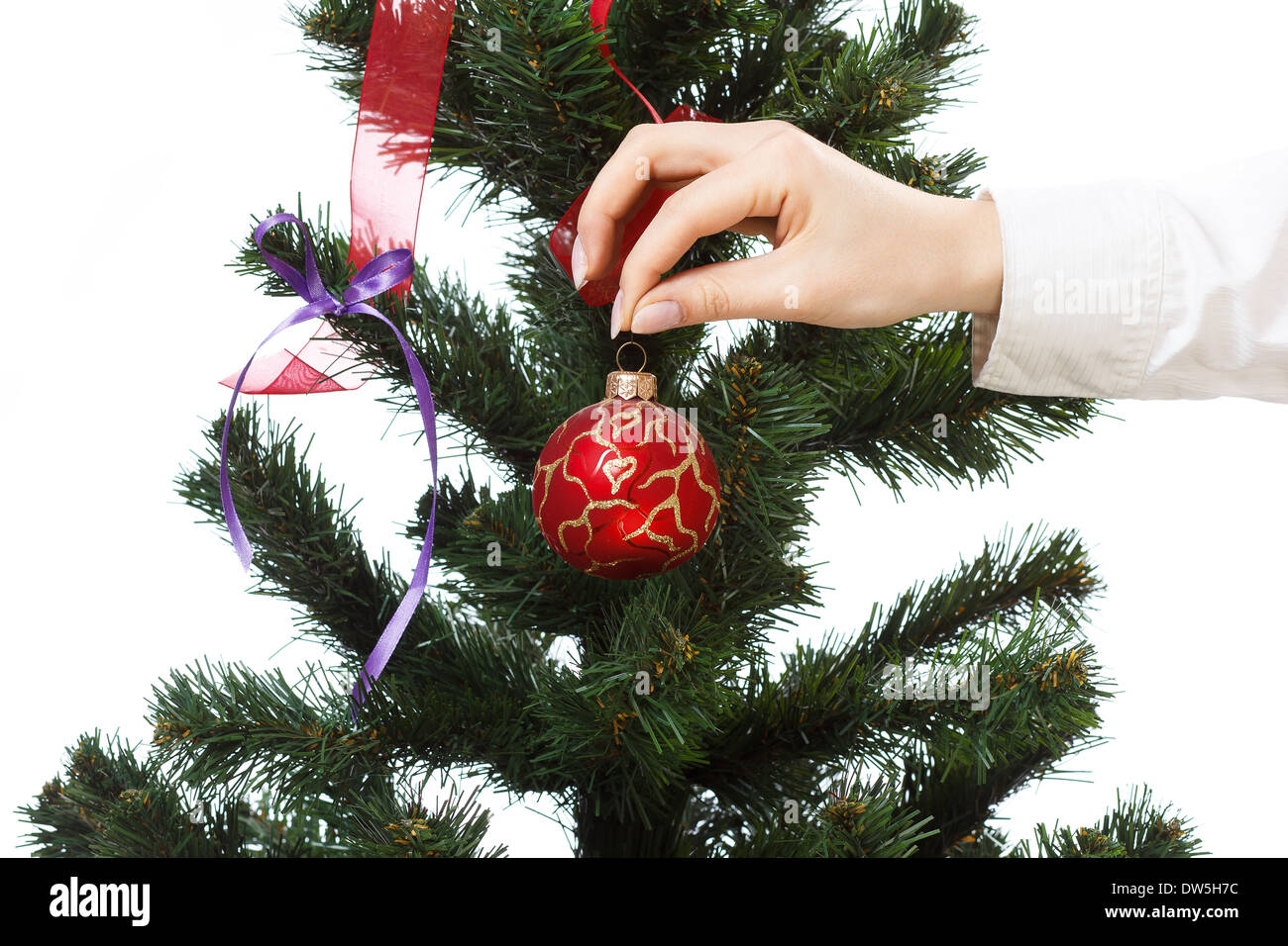 Red christmas decorative ribbons and balls on snow Stock Photo - Alamy