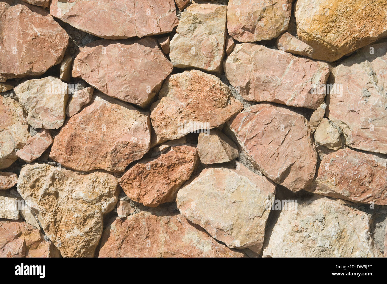 Old weathered stone wall for background Stock Photo - Alamy