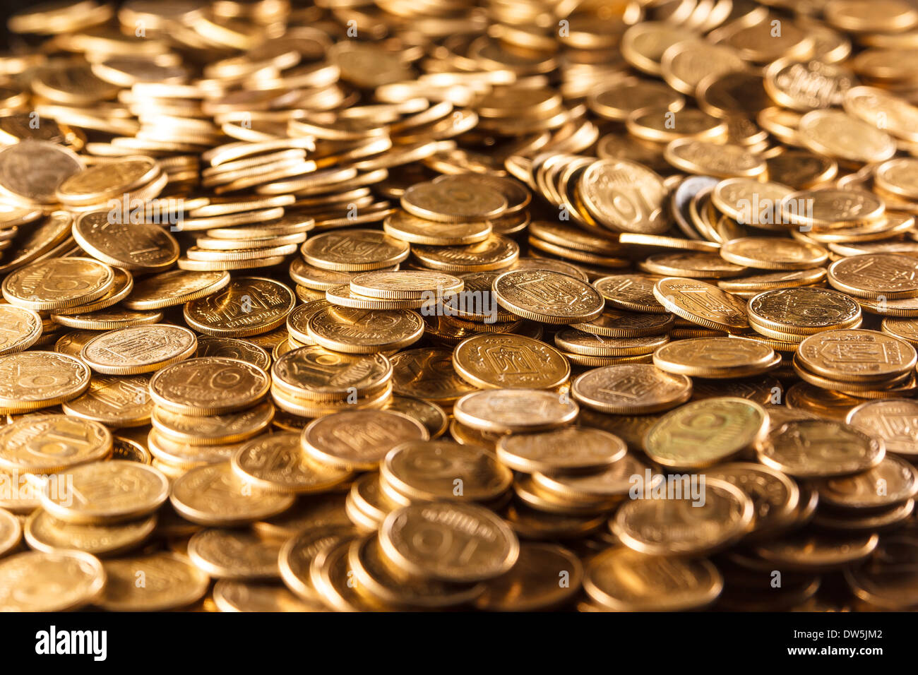 pile of coins Stock Photo - Alamy